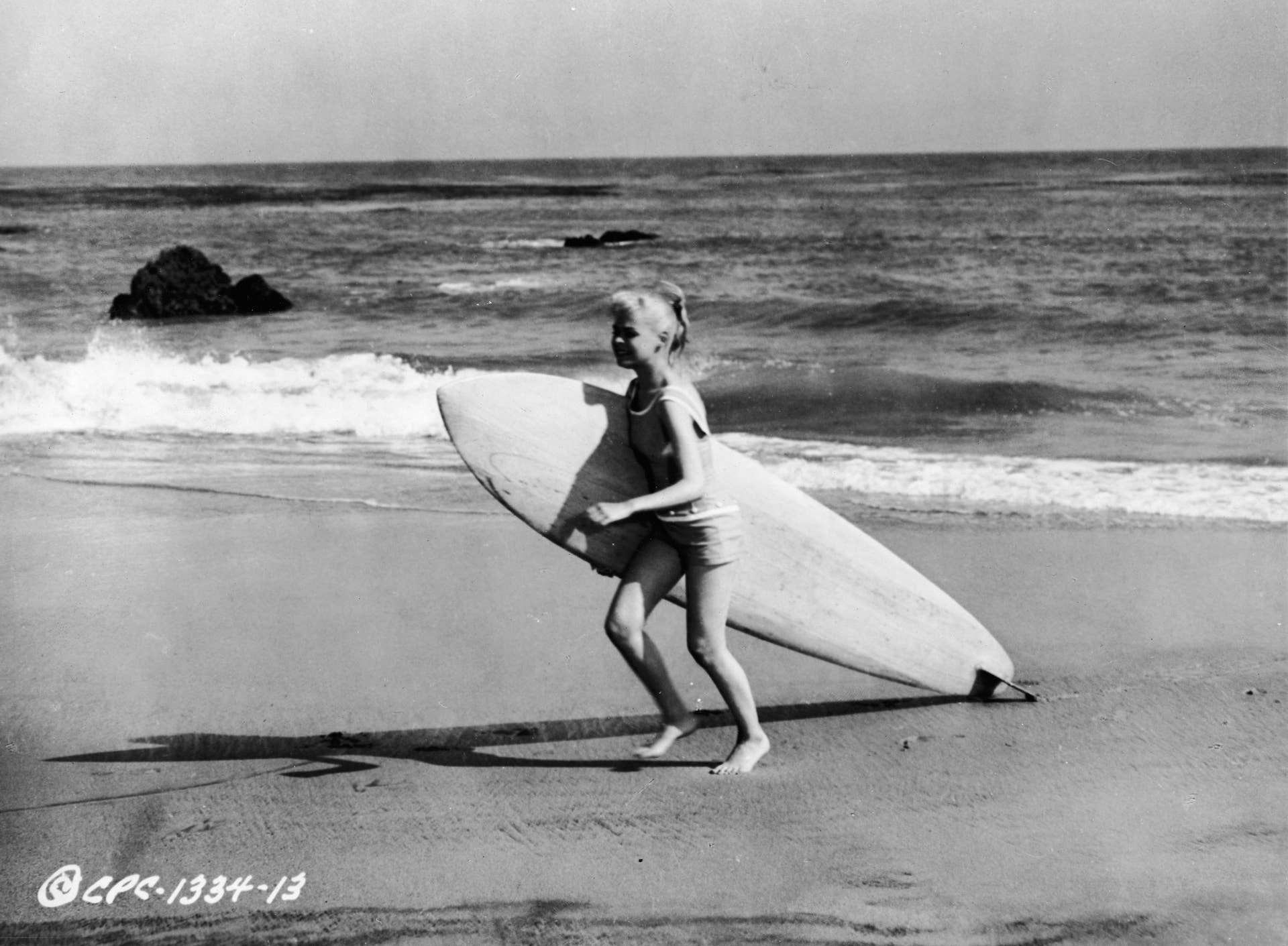 The History of Longboarding: From 24-Foot Boards to Today - Surfer