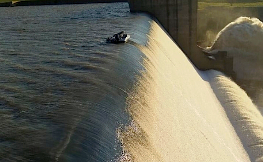 Boat Hangs Over 130Ft Dam in Harrowing Footage (Video) - Surfer