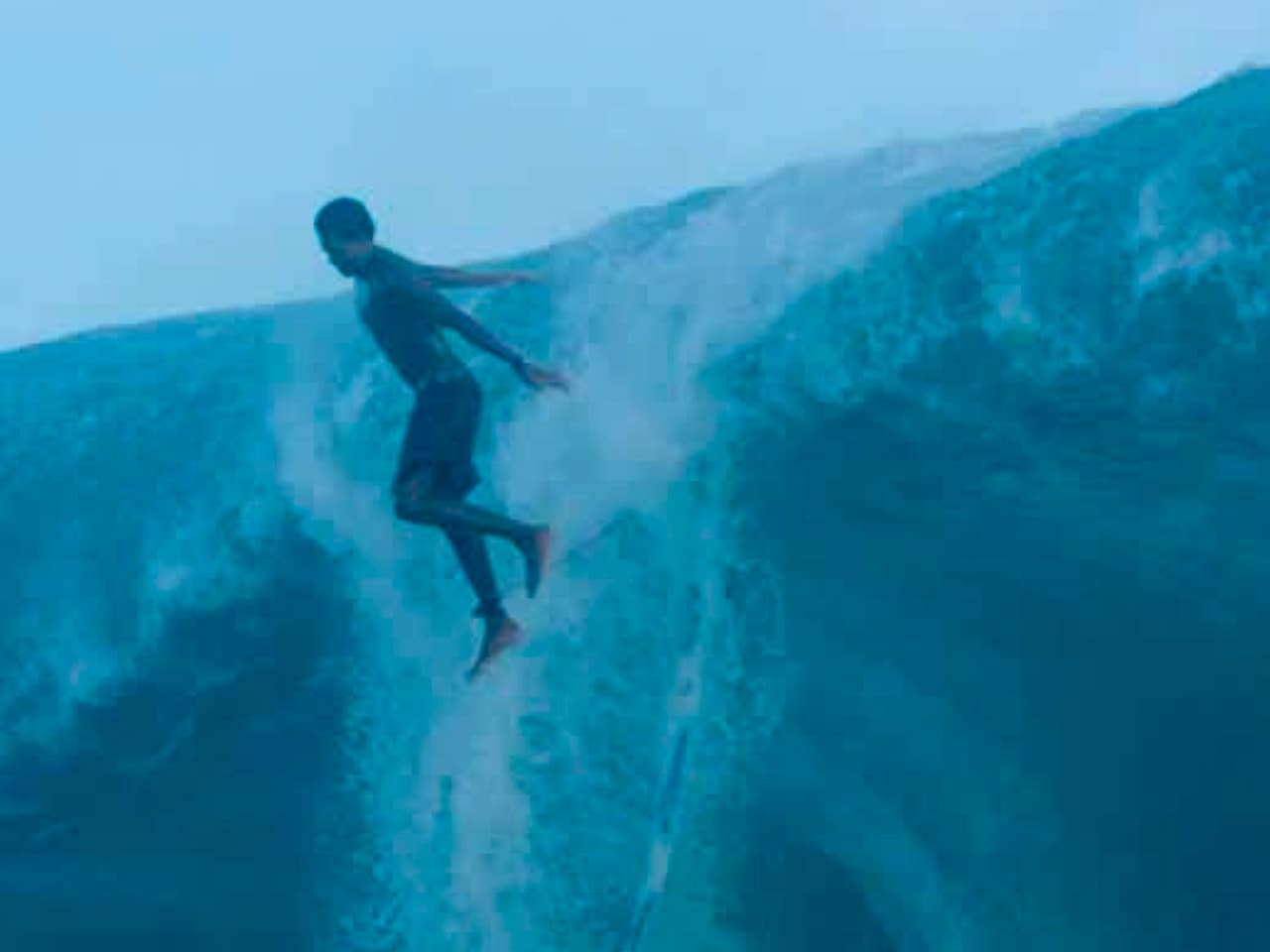 Monster 20ft Teahupo'o Wave Blasts Photographer (Video) - Surfer