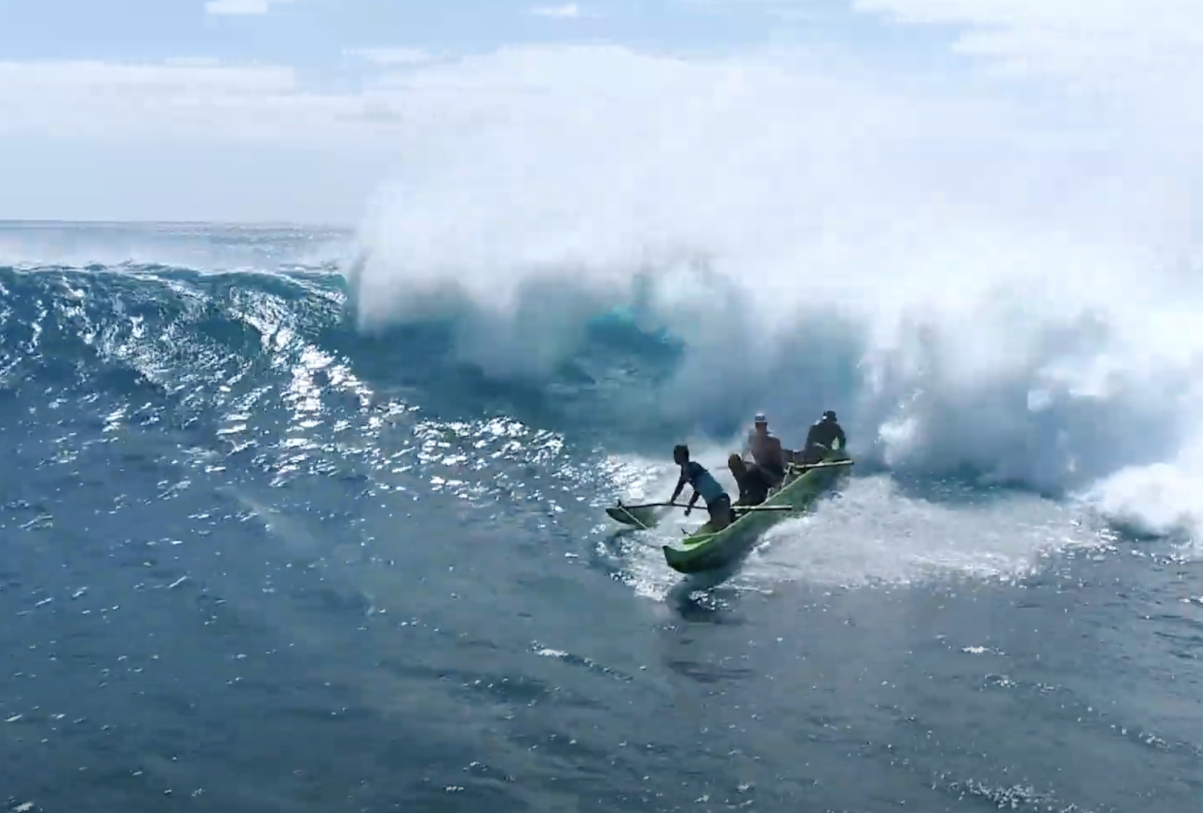 Video: Watermen Canoe Surf Big Waves at Legendary Hawaiian Surf Break