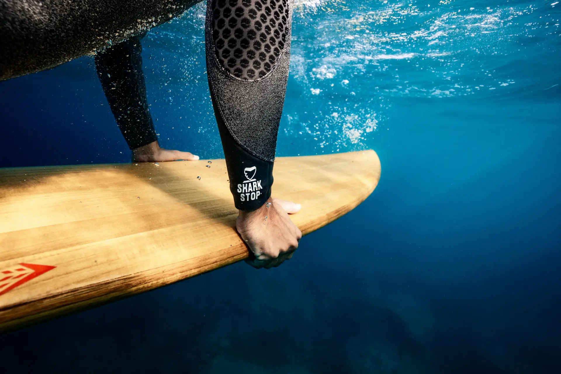 Shark Stop Shark-Bit-Resistant Wetsuits Could Save Surfers' Lives