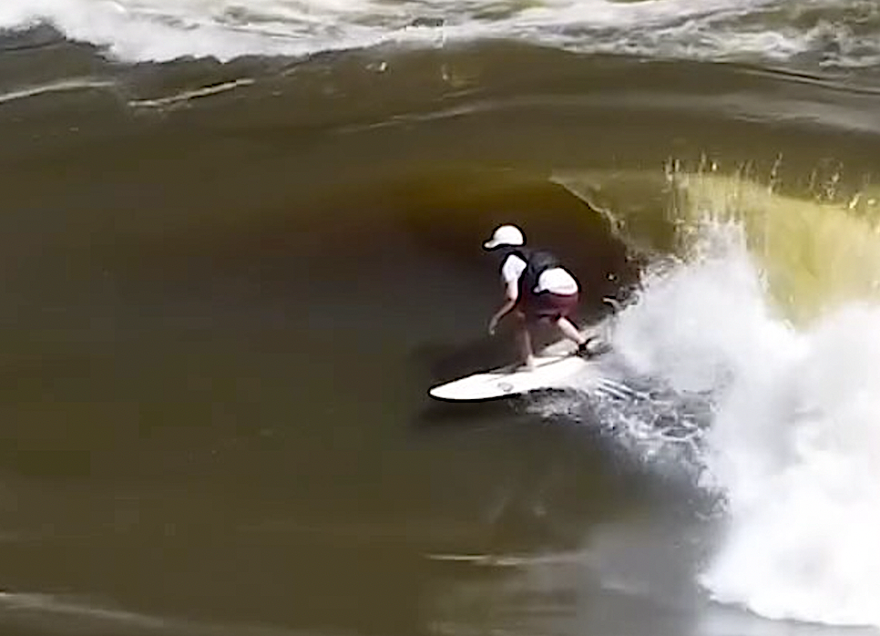 Surfer Jumps Off Whitewater Raft into River Wave (Video)