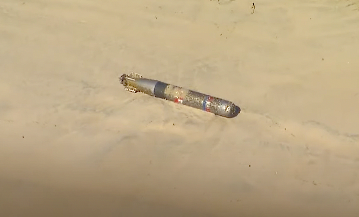 Torpedo Washes Ashore, Aussie Beach on “Lockdown” (Video)