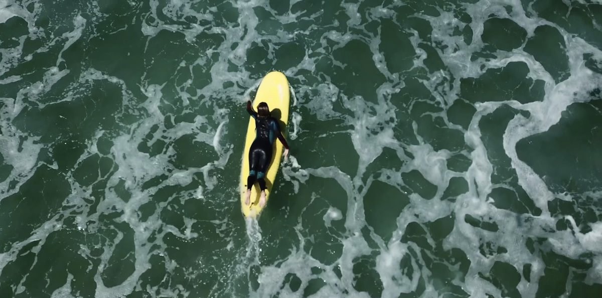 Surfing 101: How To Paddle Out and Catch Your Ideal Wave
