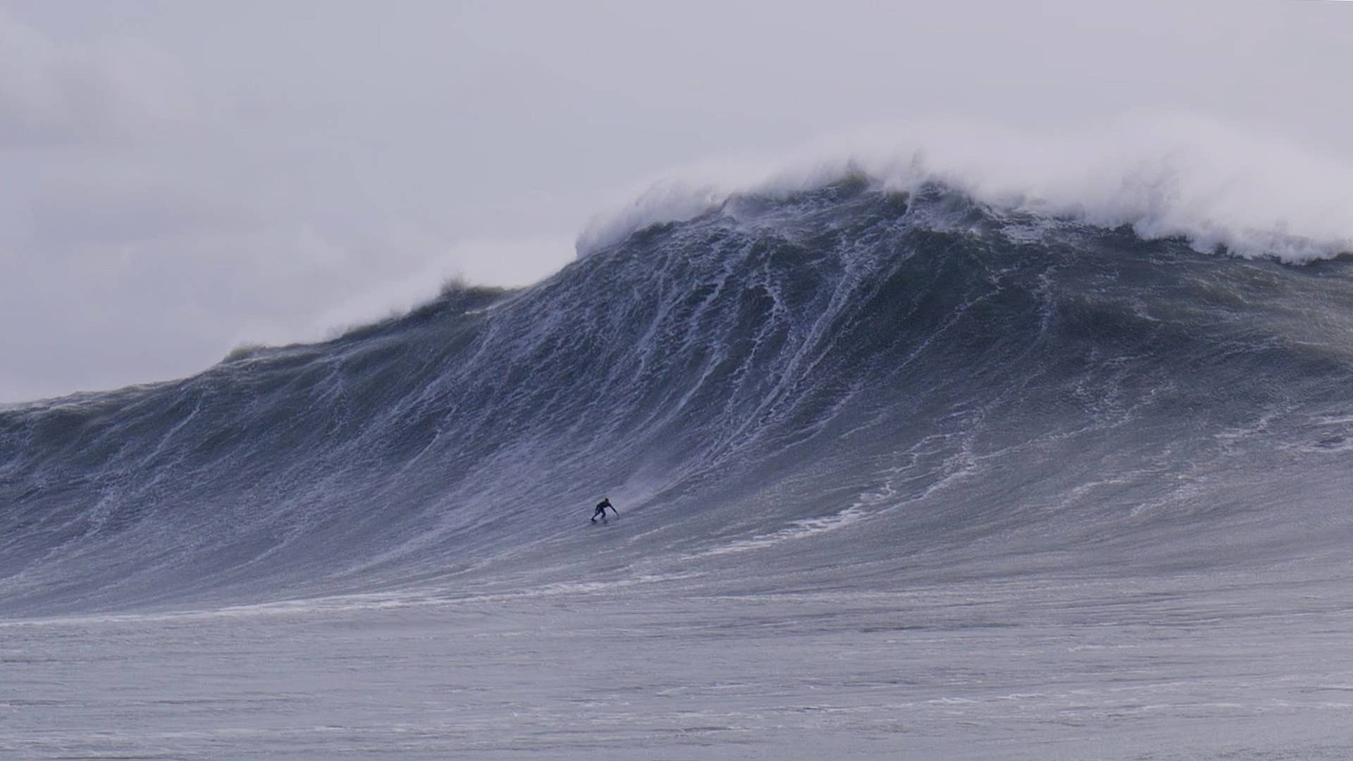 Big Wave Surfer Lucas Chianca Dives Under Nazaré Avalanche