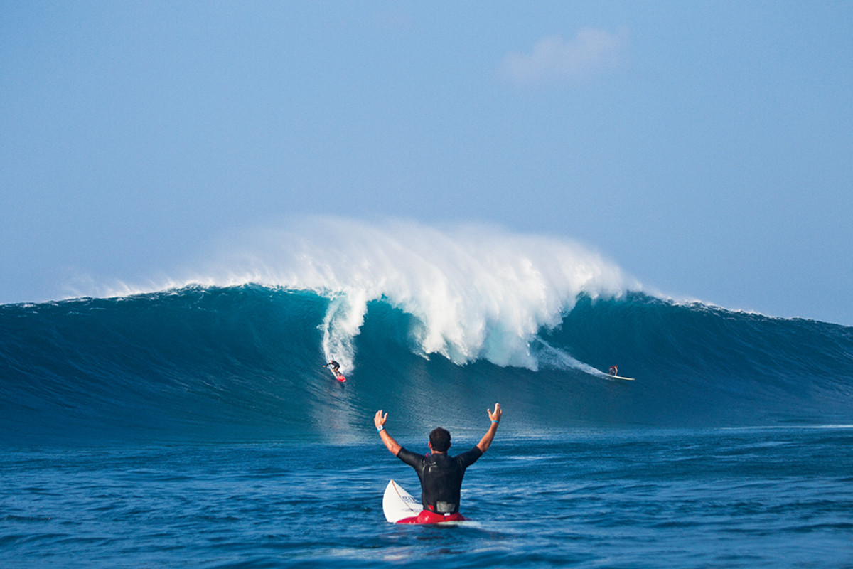 Shane Dorian, Mark Healey, and Billy Kemper. Jaws, Maui. - Surfer