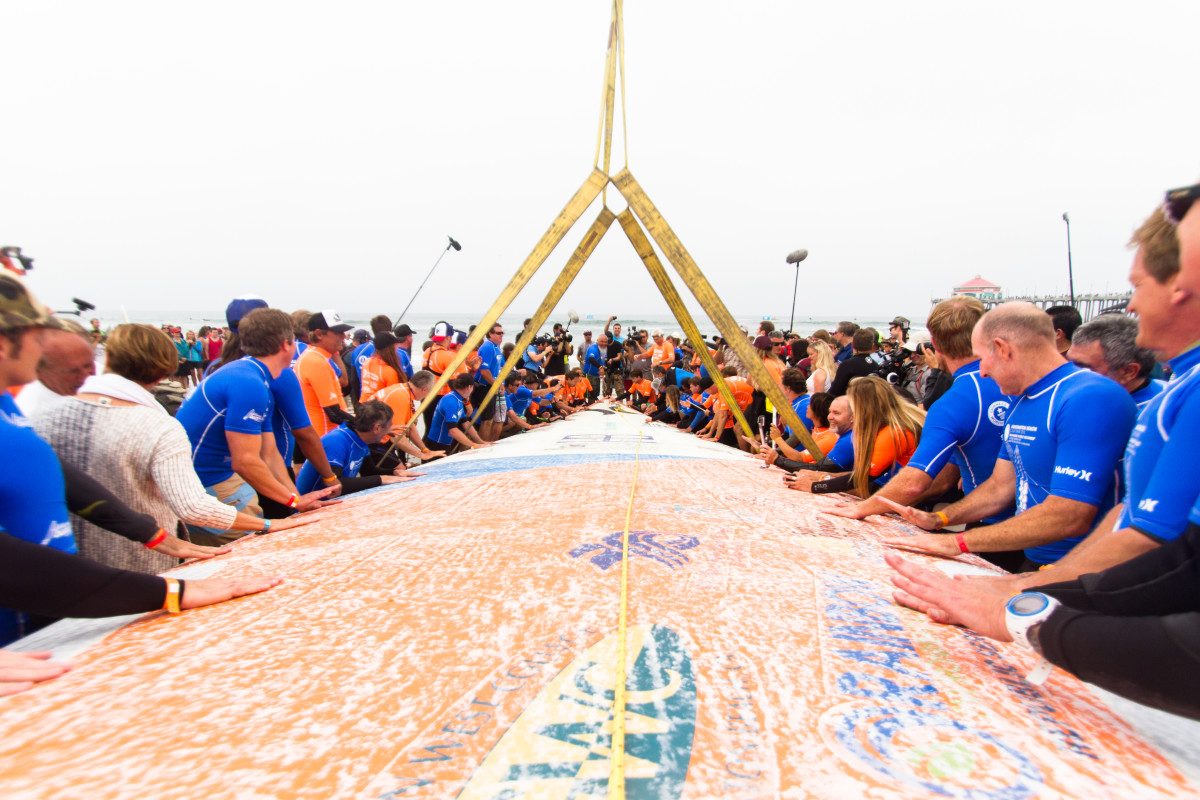 One Giant Board, Two World Records | SURFER Magazine - Surfer