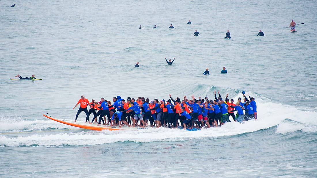One Giant Board, Two World Records | SURFER Magazine - Surfer