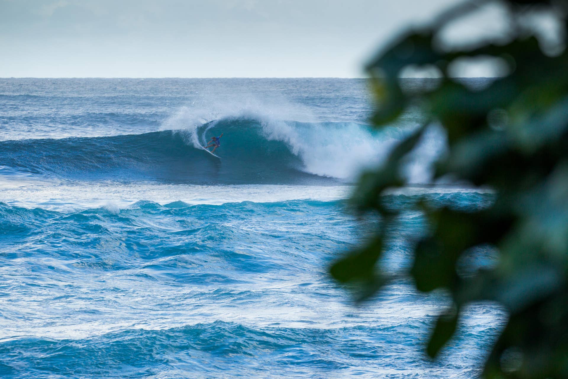 Round Three At Sunset Beach - Surfer