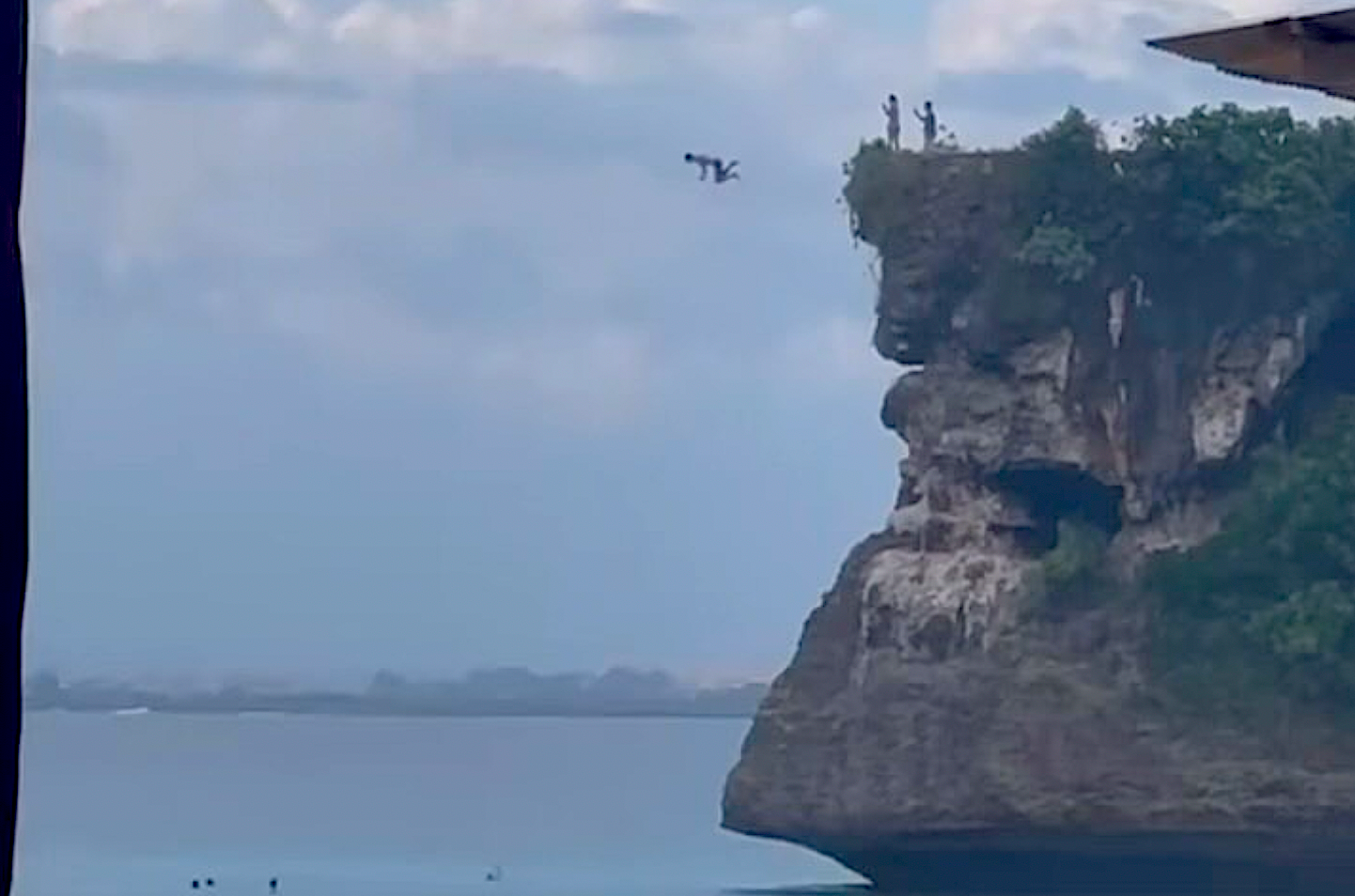 Psycho Cliff Diver Jumps 65-Foot Ledge in Bali (Video) - Surfer