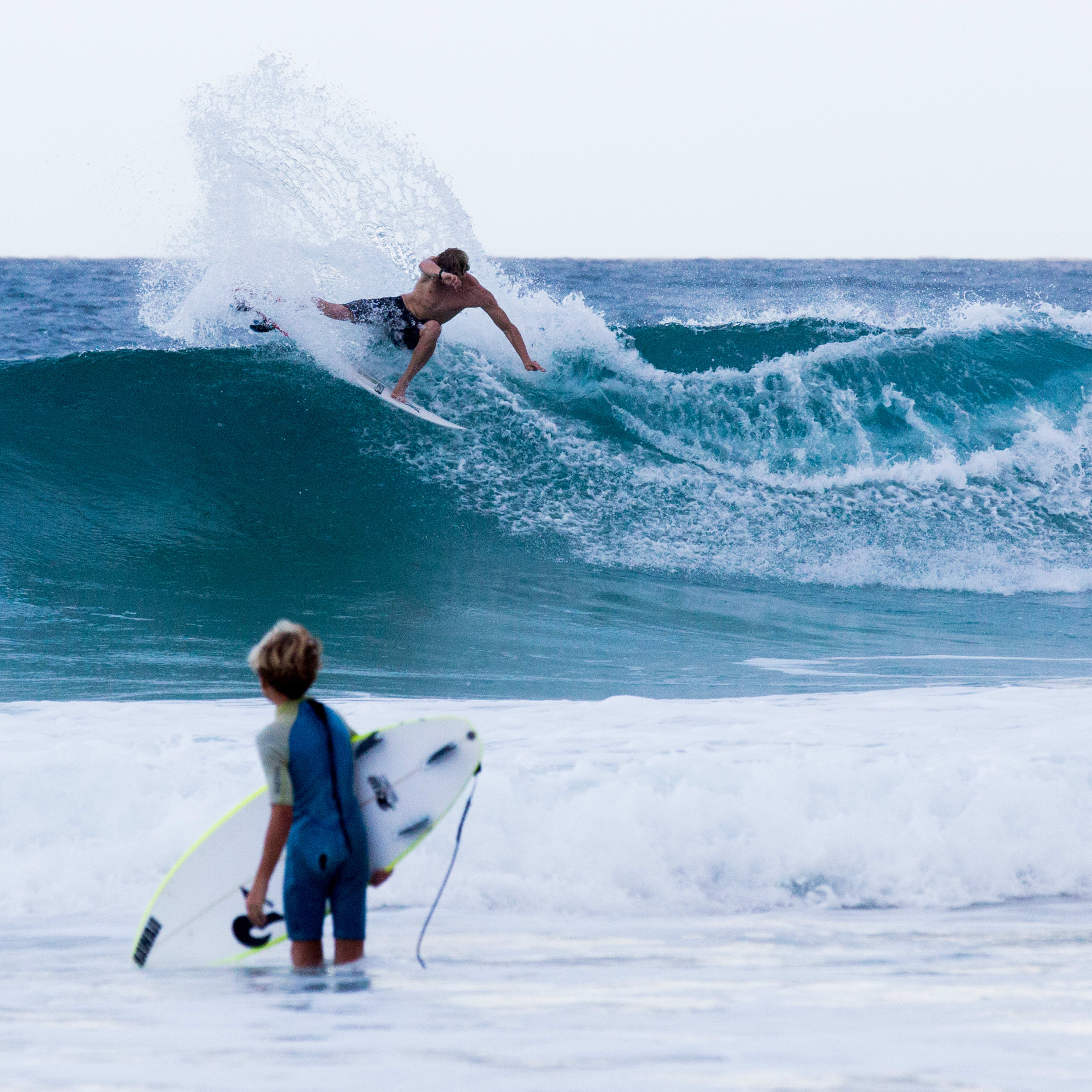Surfing Lingo 101: What Does It Mean To Hang Ten? - Surfer