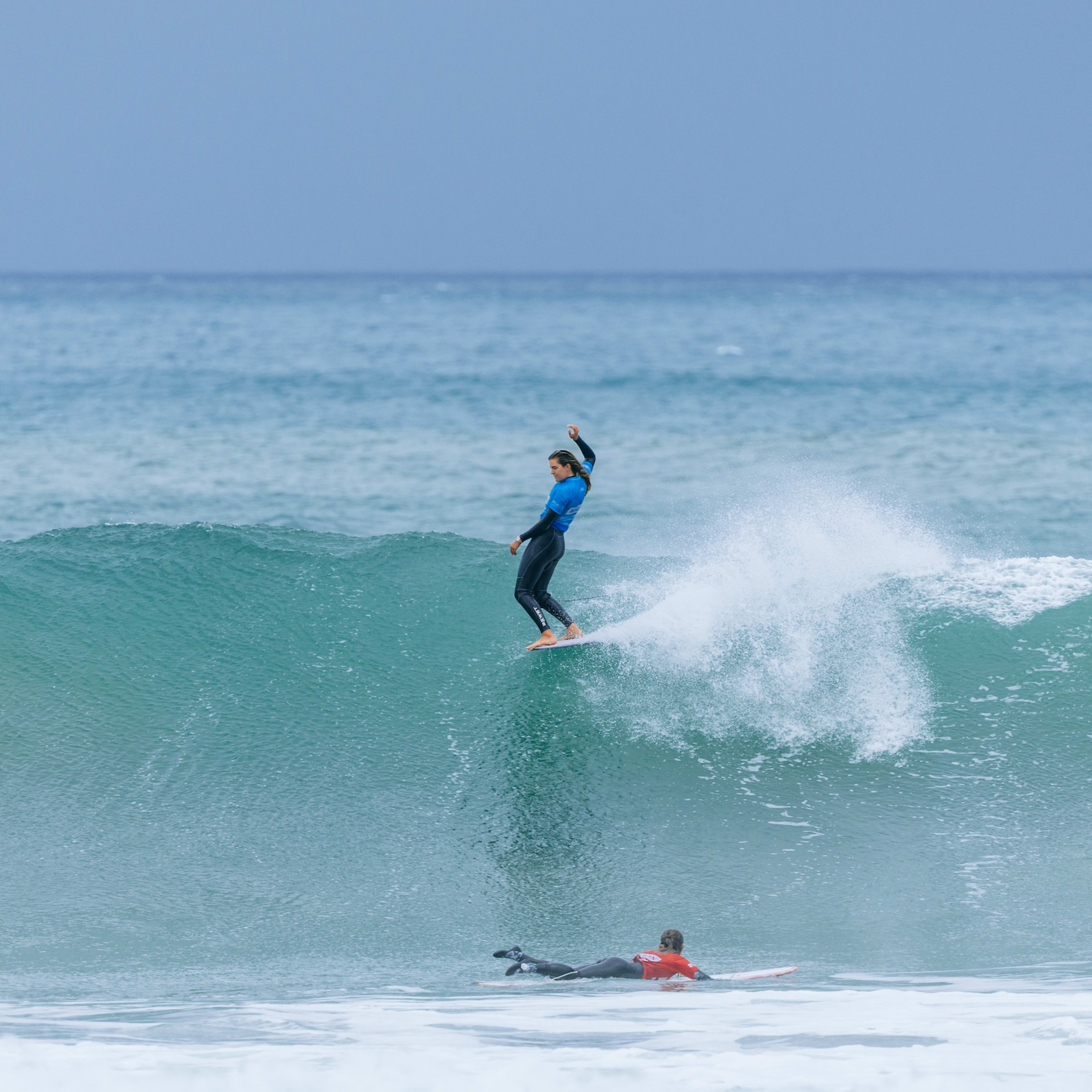 Surfing 101: How To Duck Dive and Paddle Efficiently - Surfer