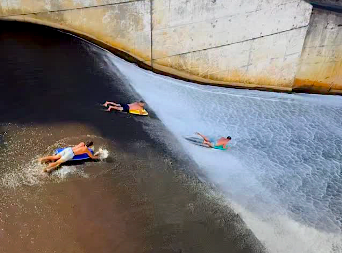Boat Hangs Over 130Ft Dam in Harrowing Footage (Video) - Surfer