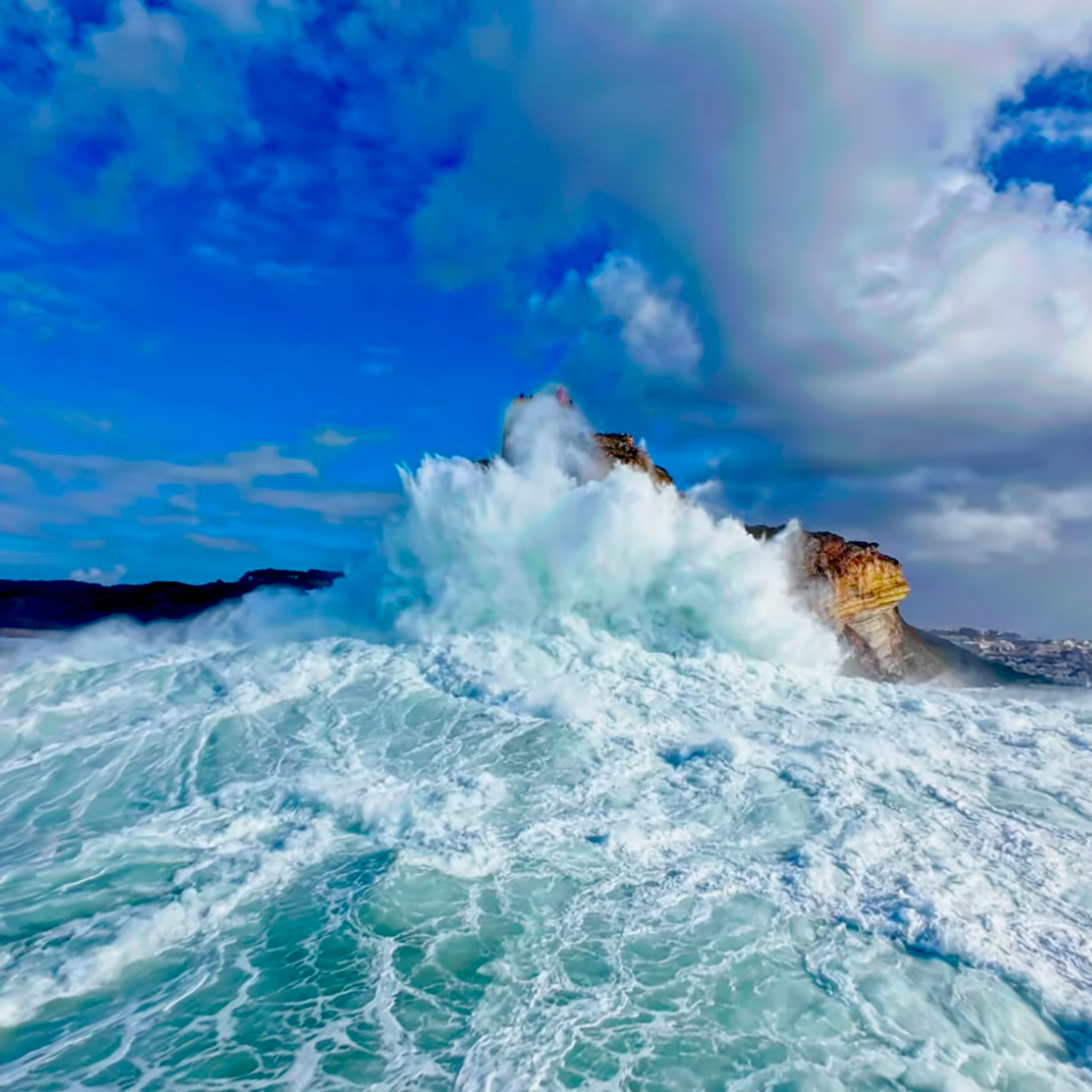 Huge Wave Smashes Nazaré Cliffs in Never-Before-Seen View (Video) - Surfer