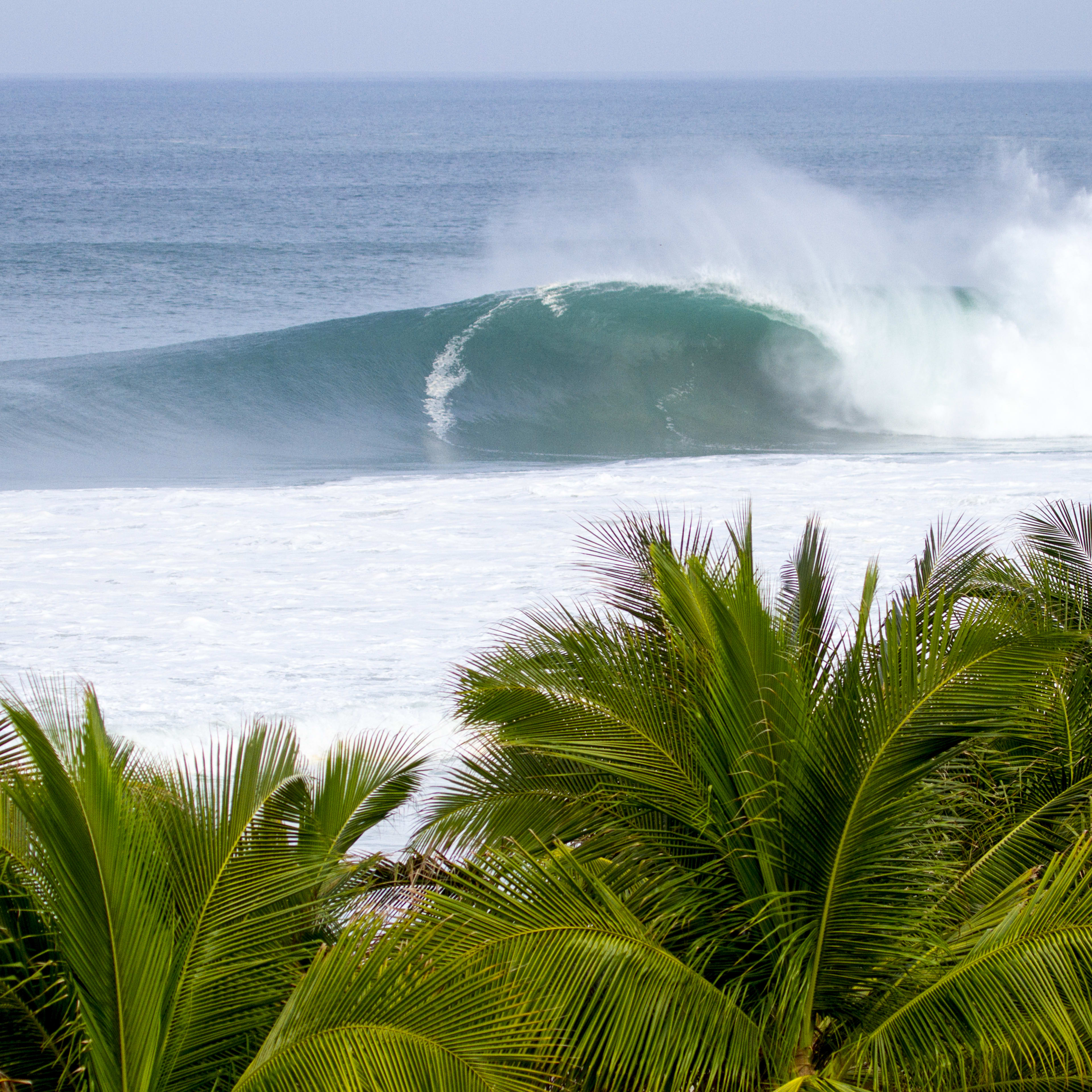 The Secret Behind the Bermuda Triangle? 100-Foot Waves. - Surfer
