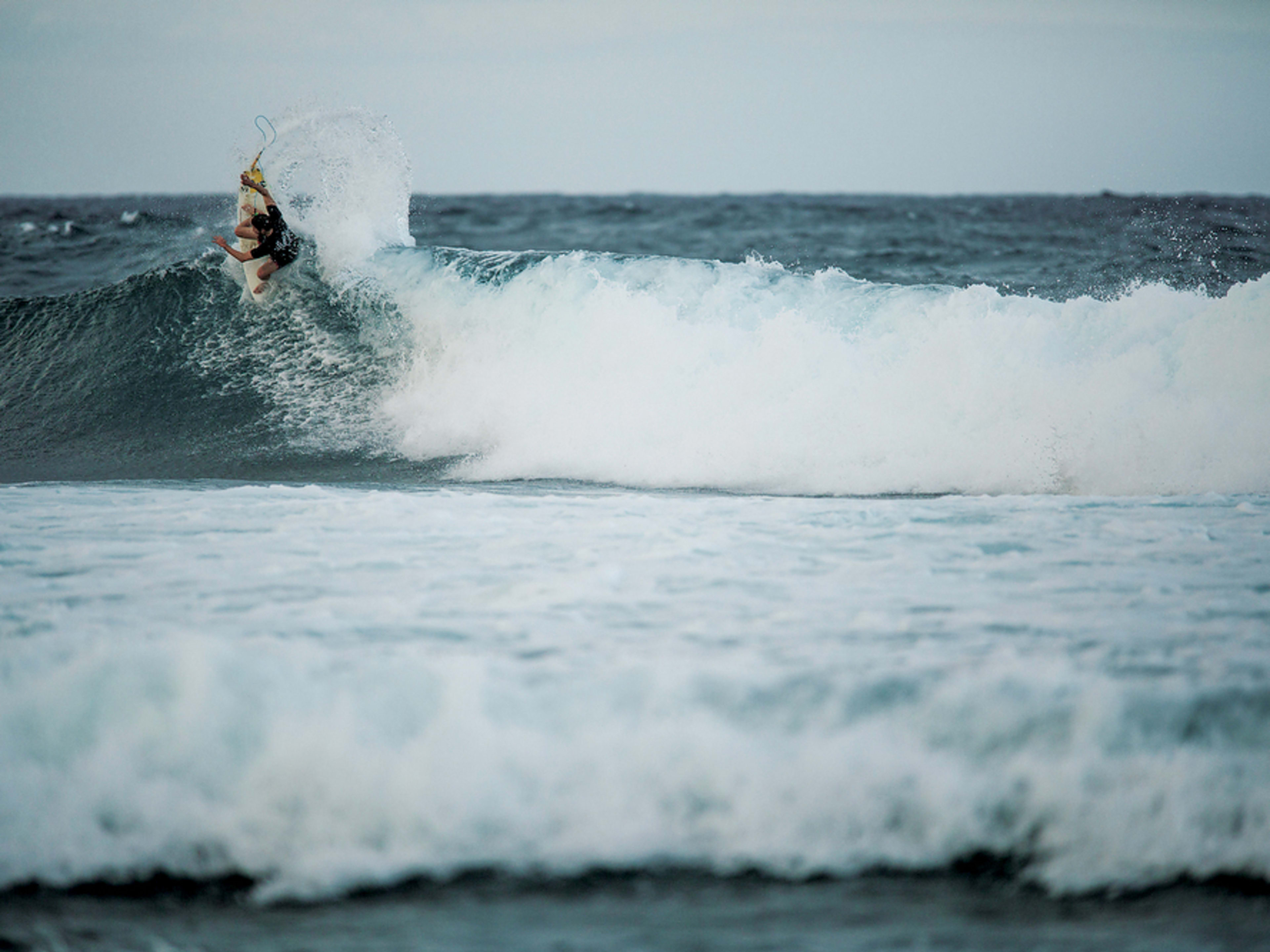 Monday Photos: Gold - Surfer