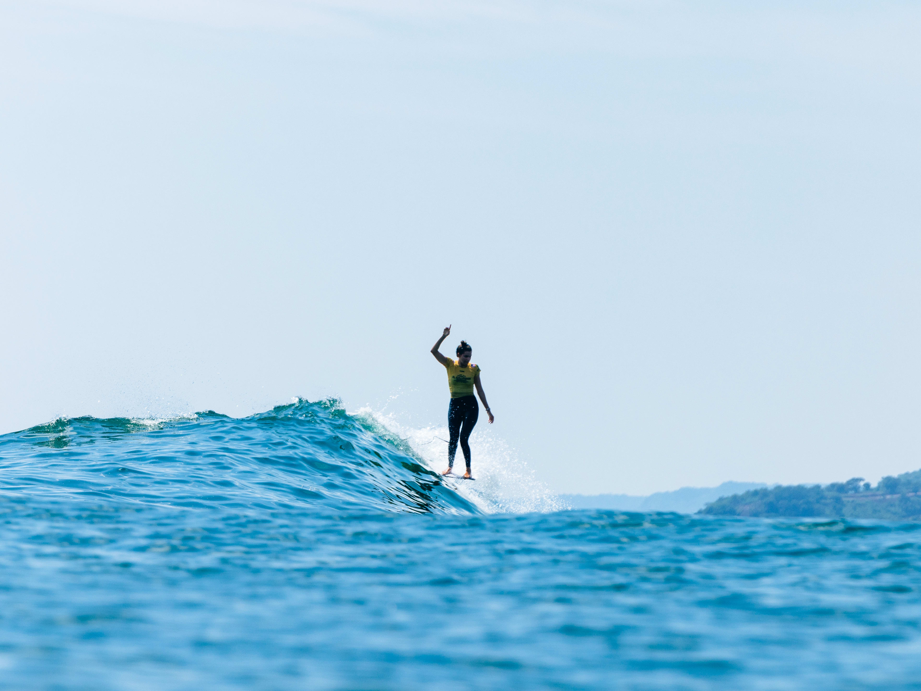 How to Master the Art of Noseriding on a Surfboard - Surfer