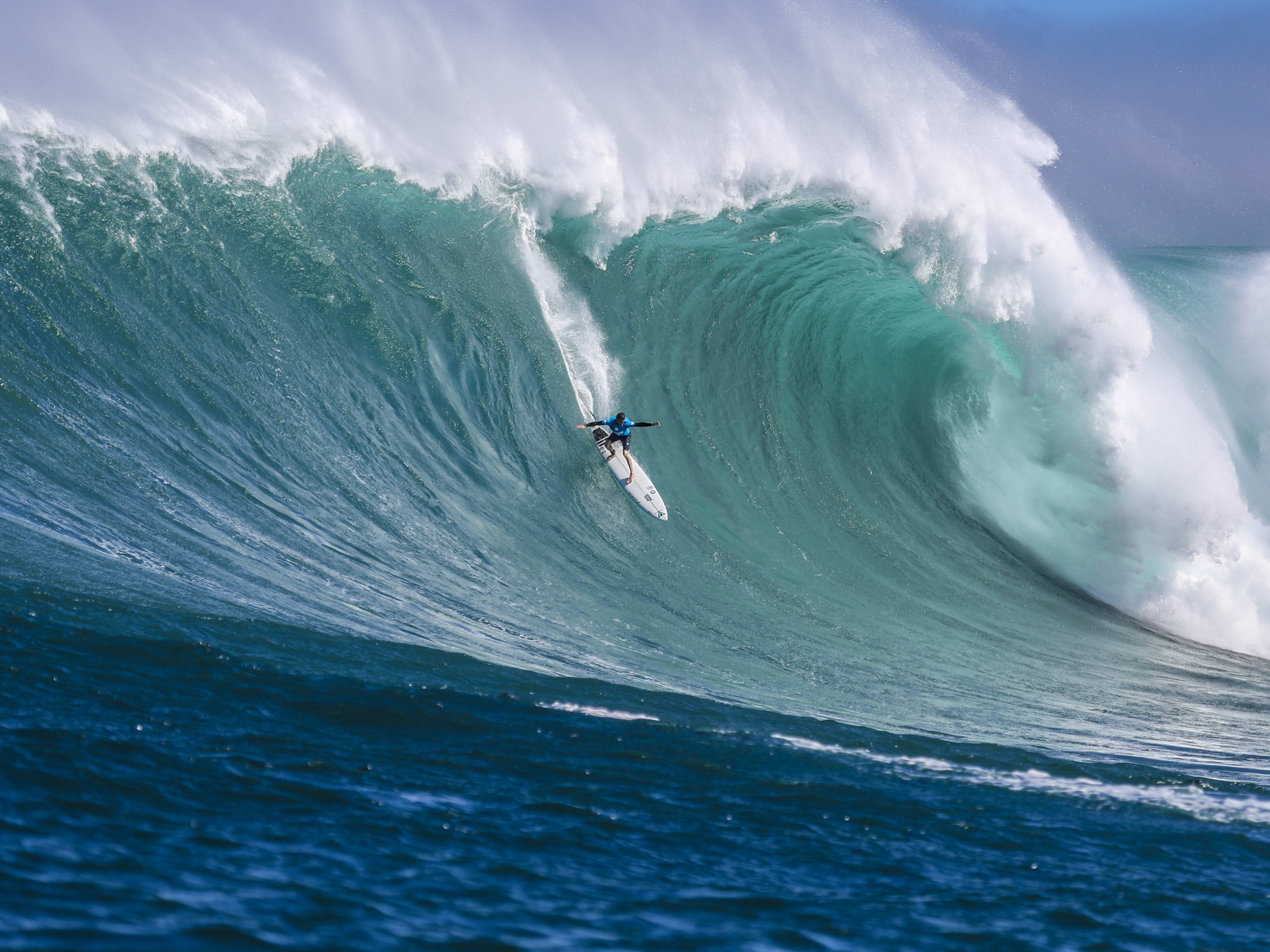 The Top 10 Biggest Waves Ever Surfed - Surfer