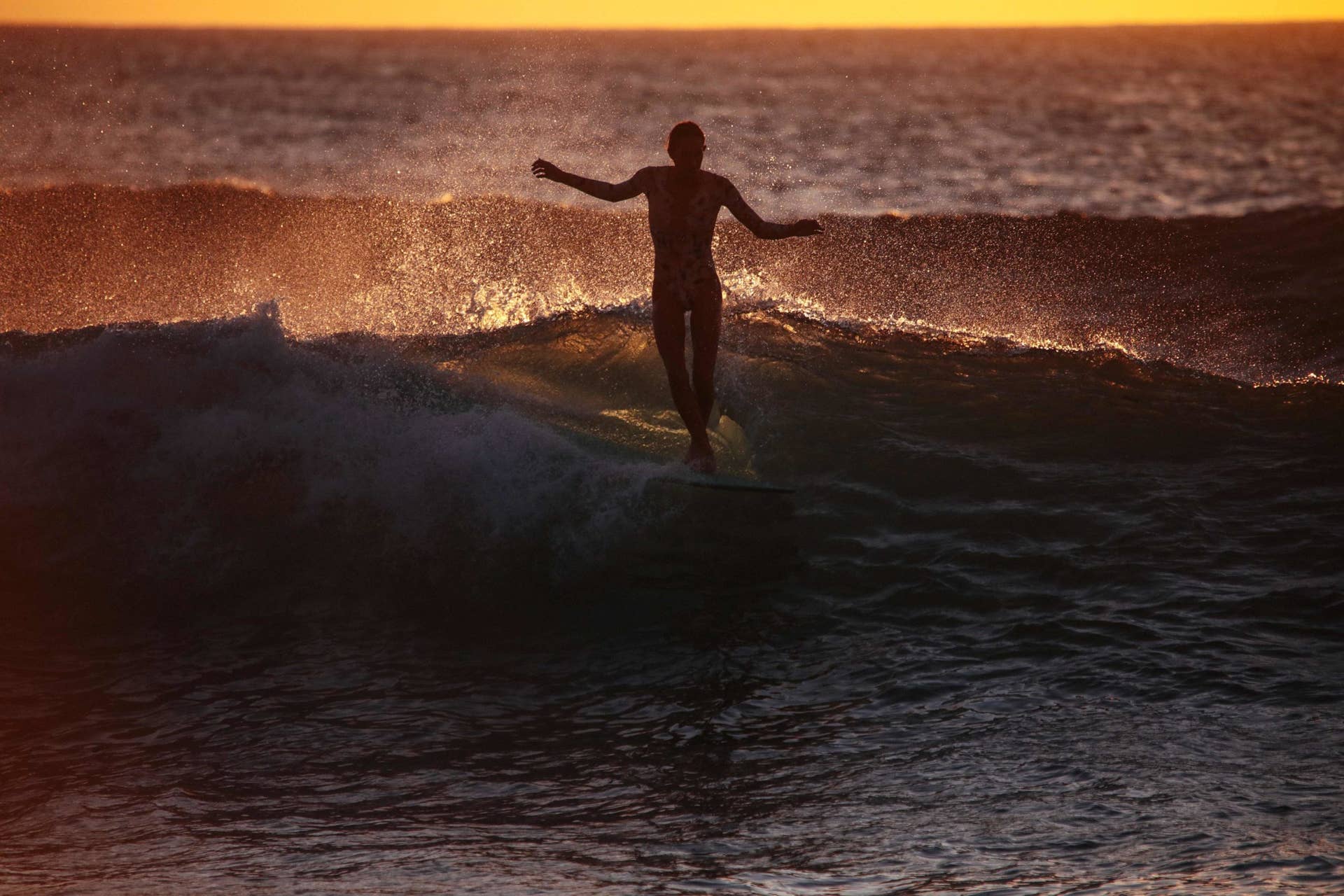 12 Top Female Surf Photographers to Follow Right Now