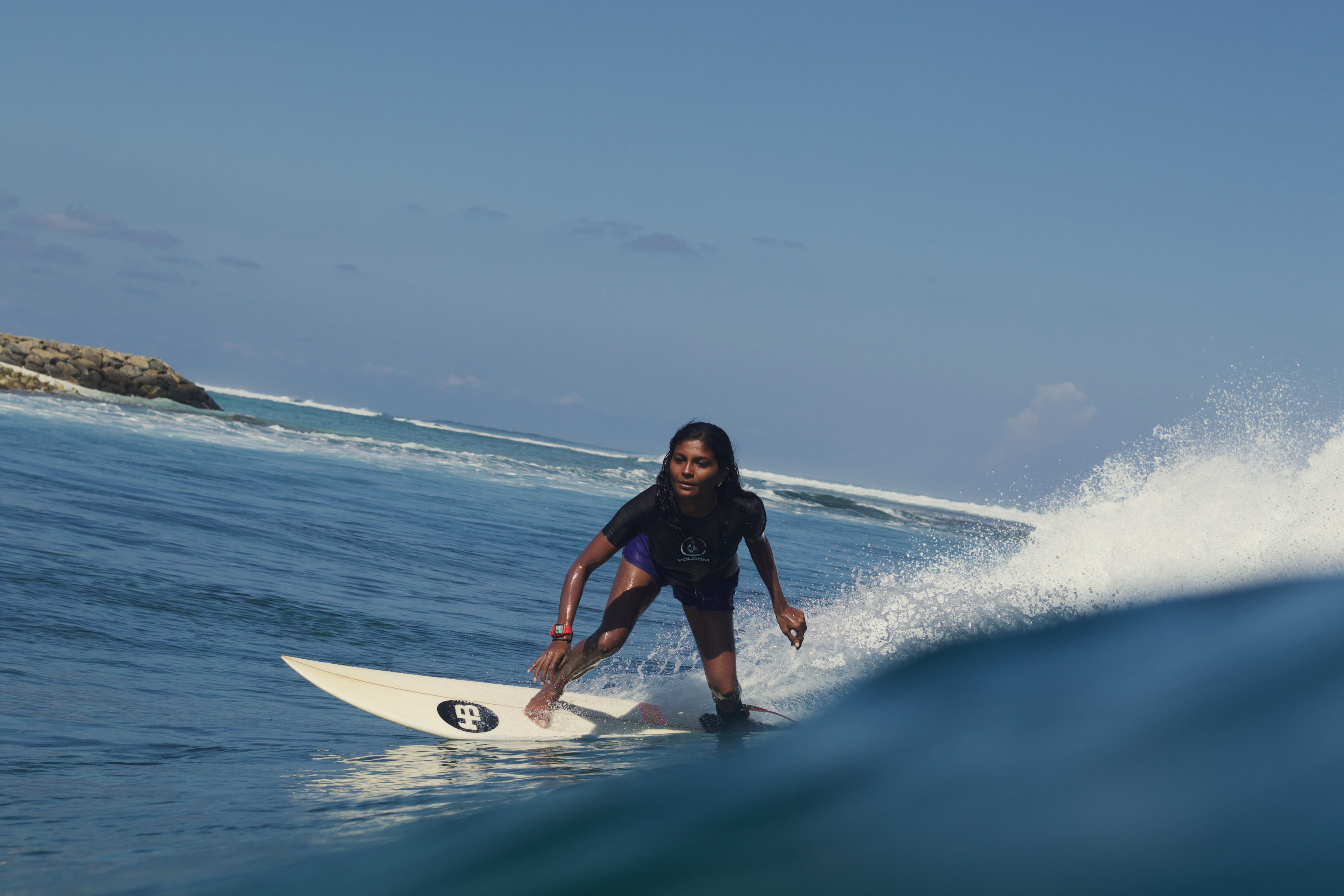 How to Master the Art of Noseriding on a Surfboard - Surfer