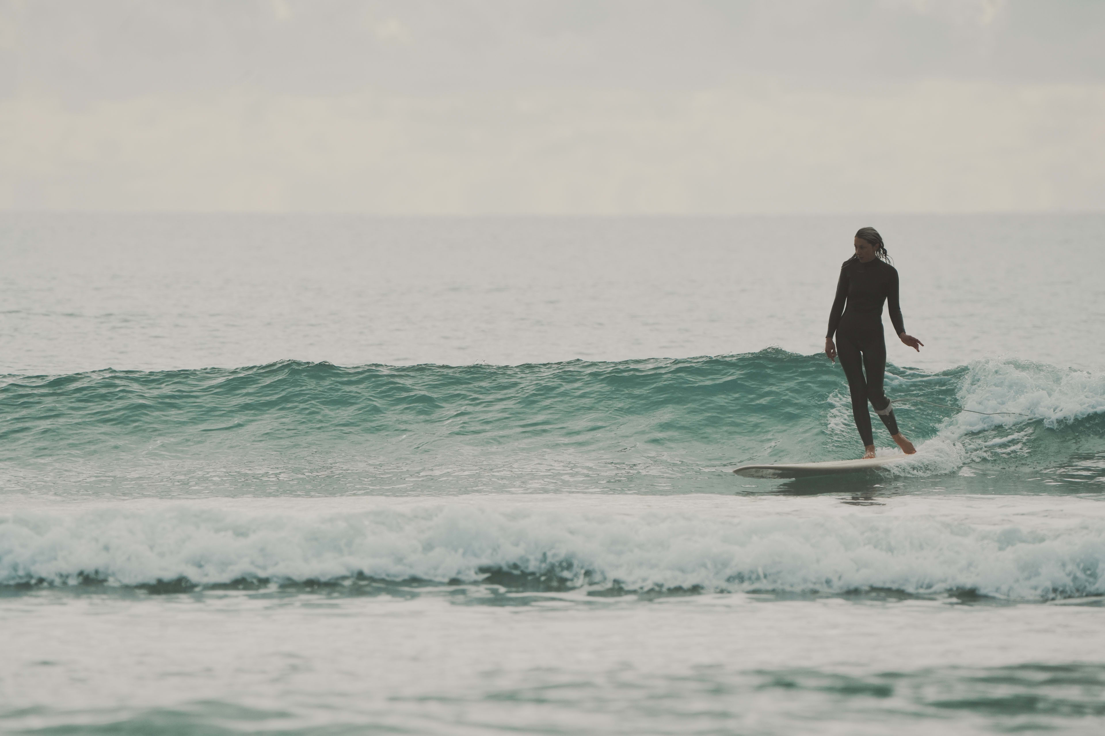 Surfing Lingo 101: What Does It Mean To Hang Ten? - Surfer
