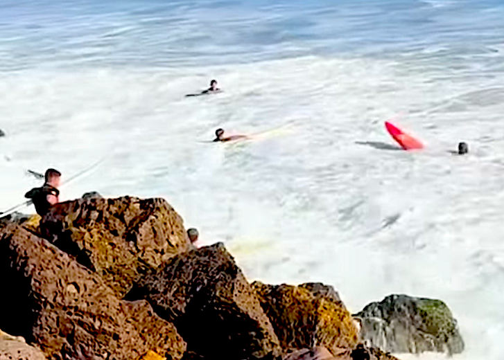 Surfers Slammed Against Rocks During Hurricane Swell (Video) - Surfer