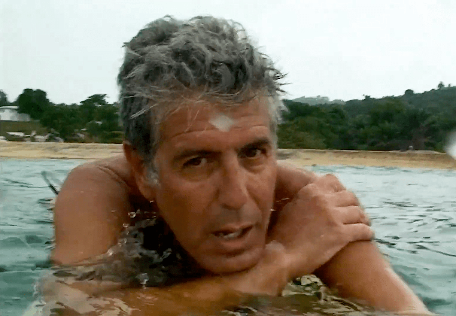 Throwback: Anthony Bourdain Attempts to Surf in Liberia (Video) - Surfer